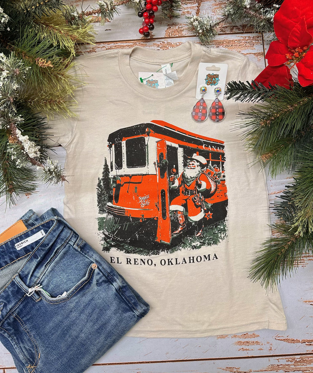 El Reno Cowboy Santa Trolley Tee – Bronze Seal